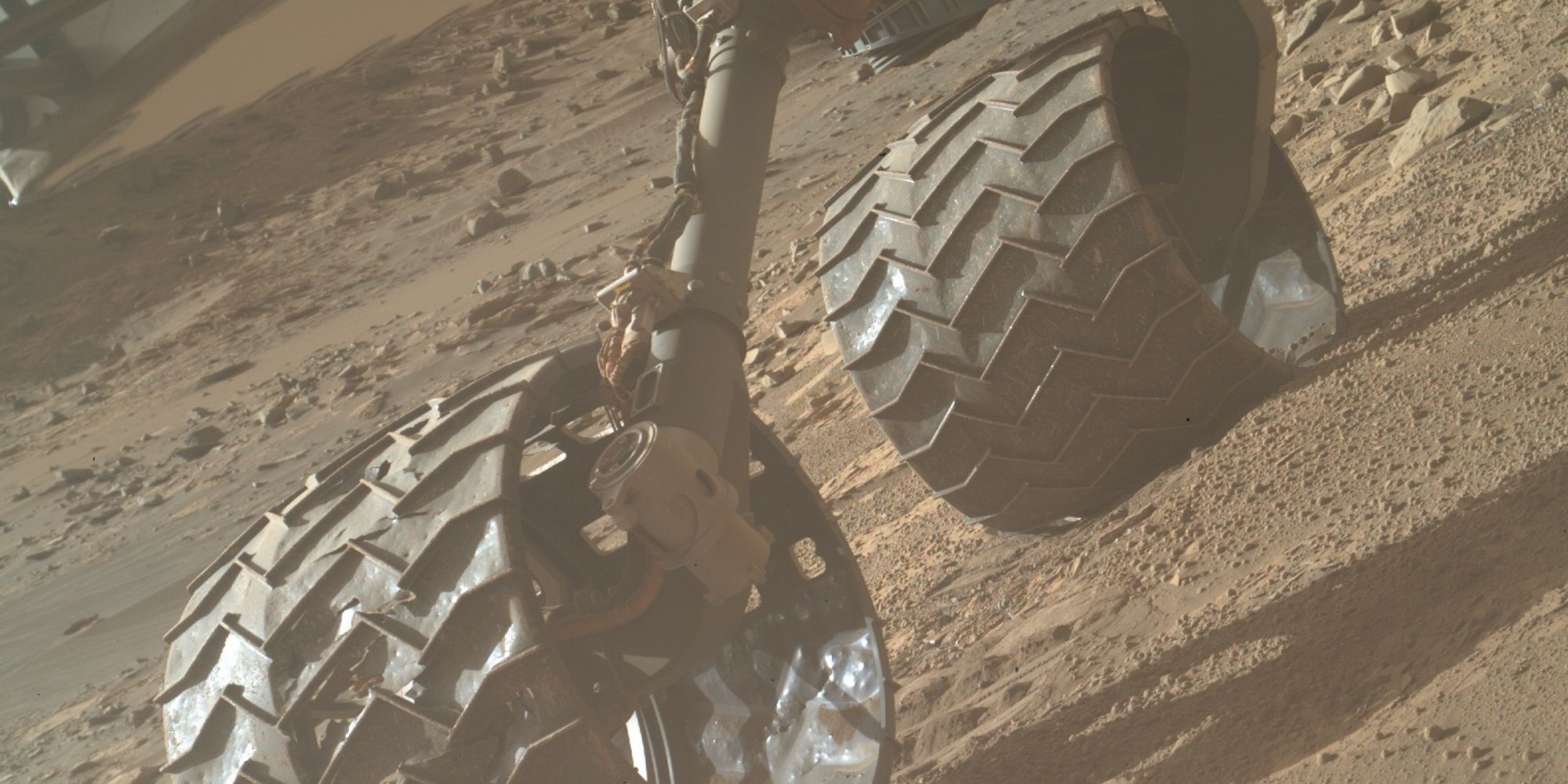 Curiosity Rover Takes A Break From Mars Exploring To Look At Its Wheels