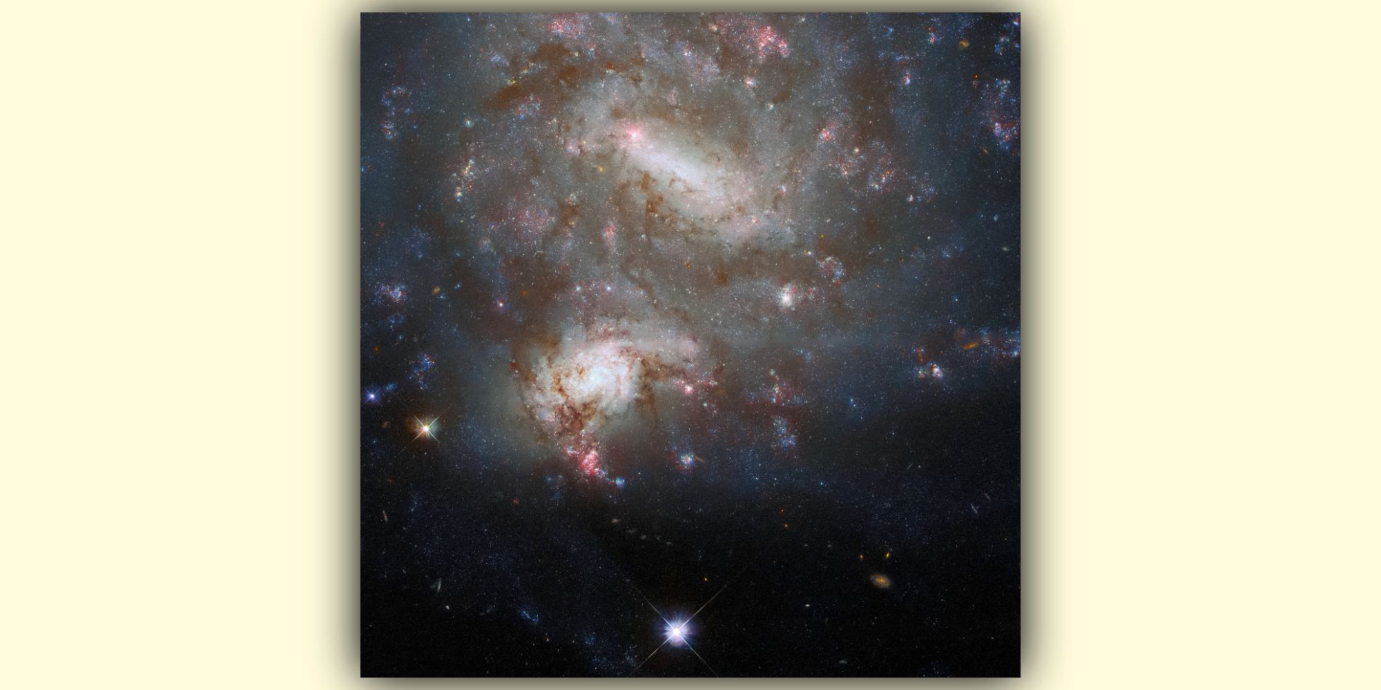 There's A Big Secret Behind This Hubble Photo Of Two Beautiful Galaxies